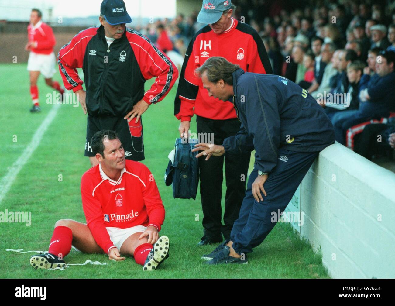 New Nottingham Forest manager David Platt talks to injured player Steve ...