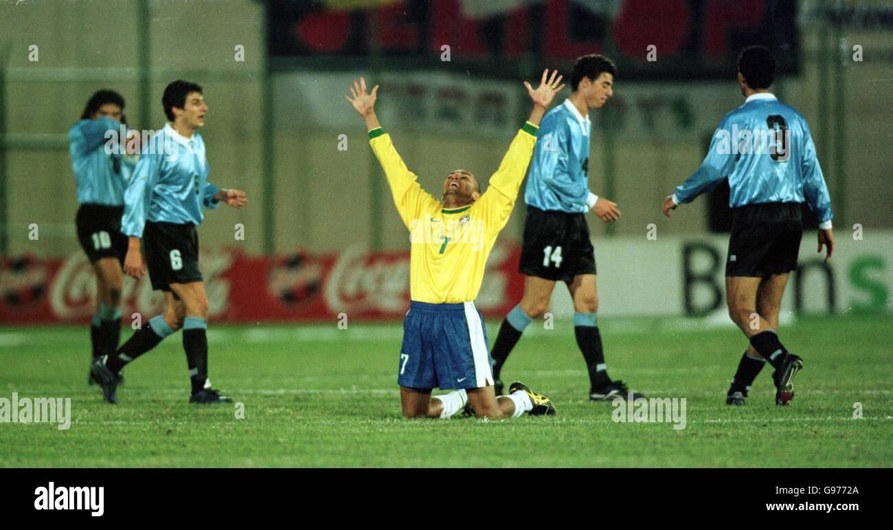 Amoroso of Brazil celebrates on the final whistle as Brazil defeat ...