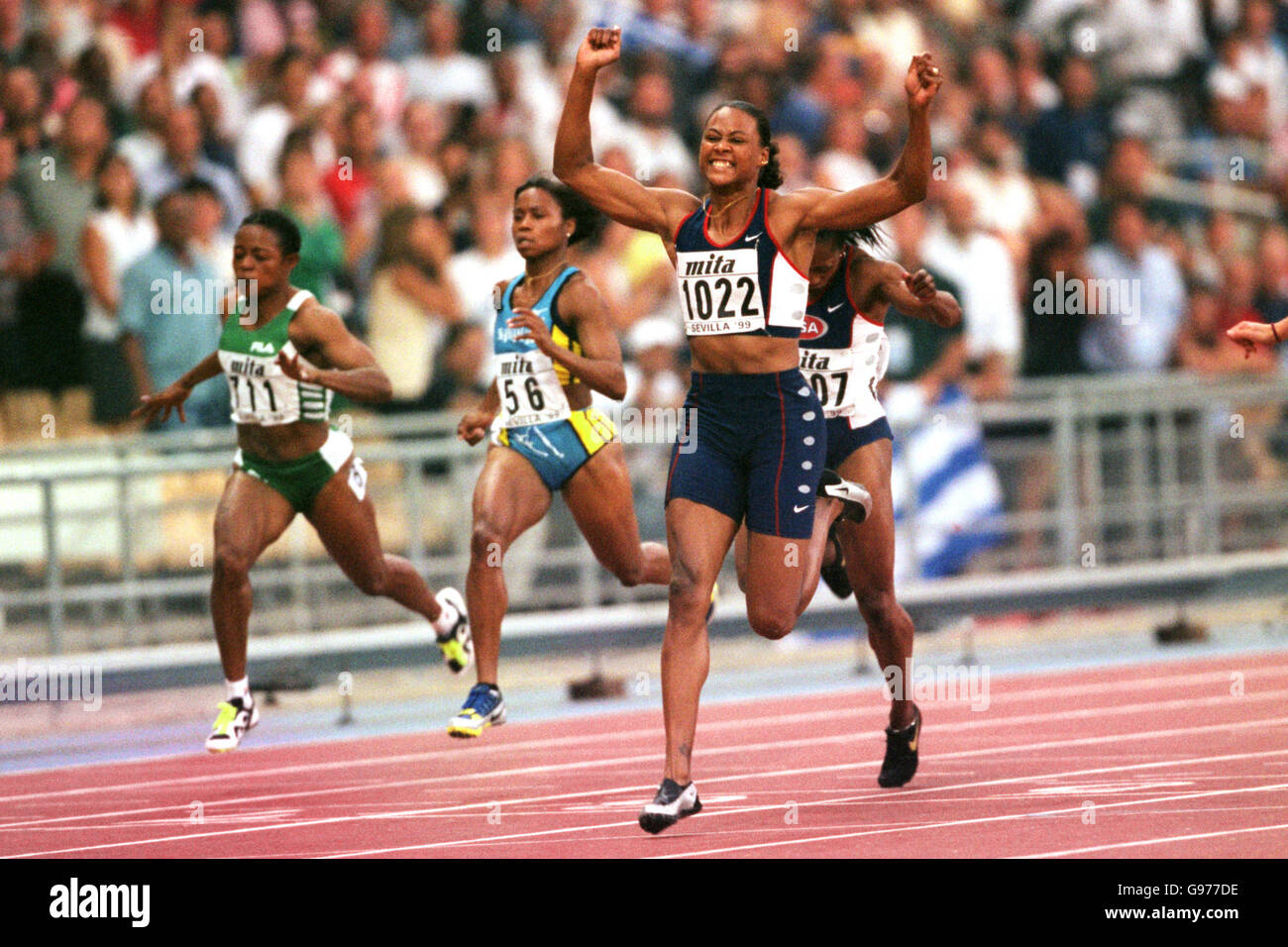 Marian jones wins the 100m final hi-res stock photography and images ...