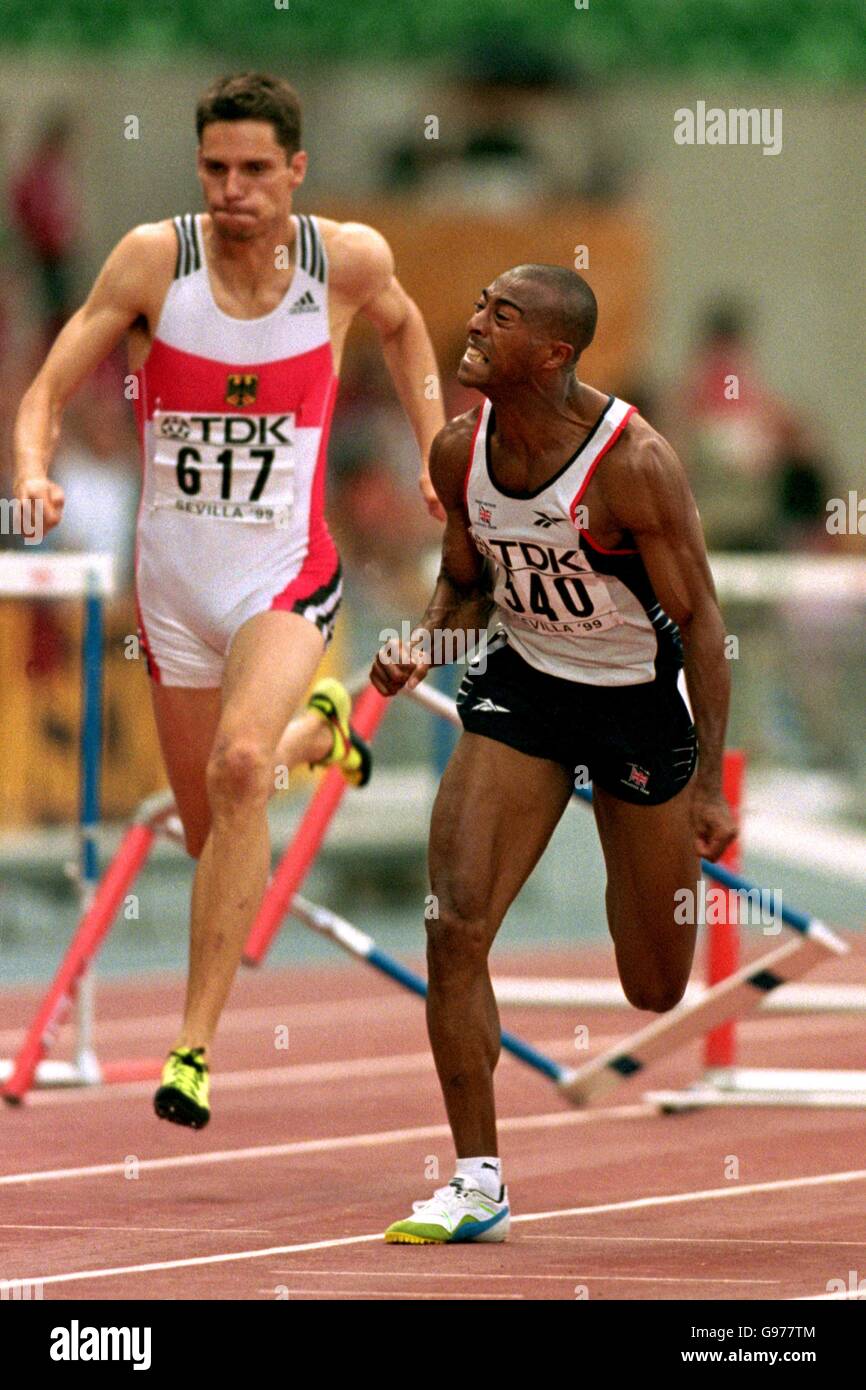 Colin Jackson lunges for the line as he wins gold in the 110m hurdles ...
