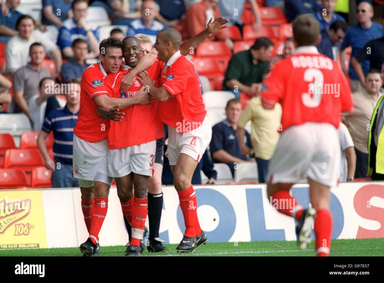 Nottingham Forest's Ian Wright is congratulated on his debut goal by ...