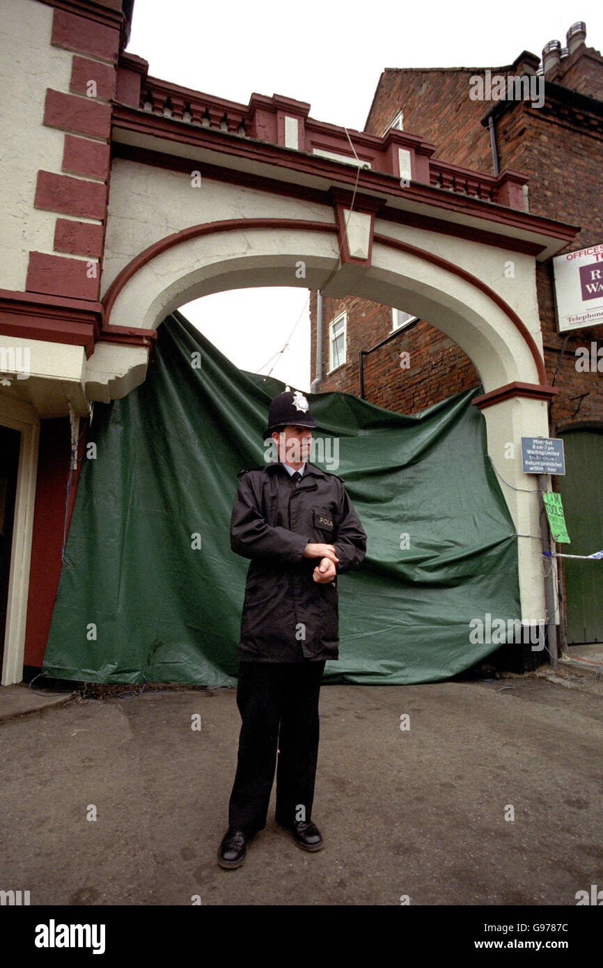 Police guard entrance to michael samms workshop hi-res stock ...