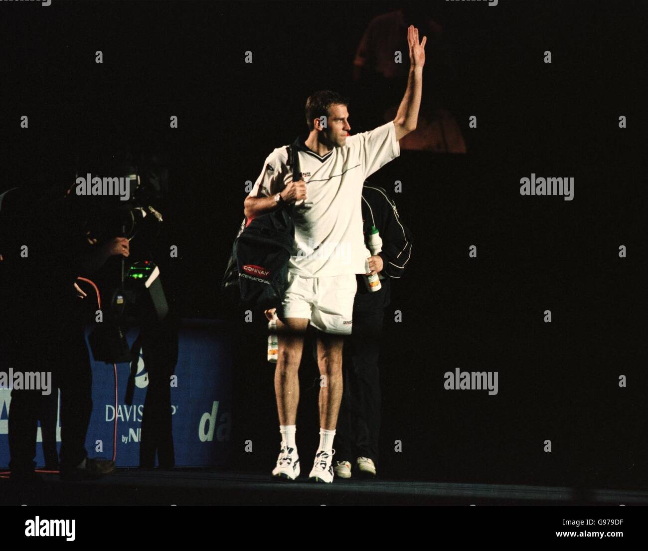 Greg Rusedski arrives on court for his match against South Africa's ...