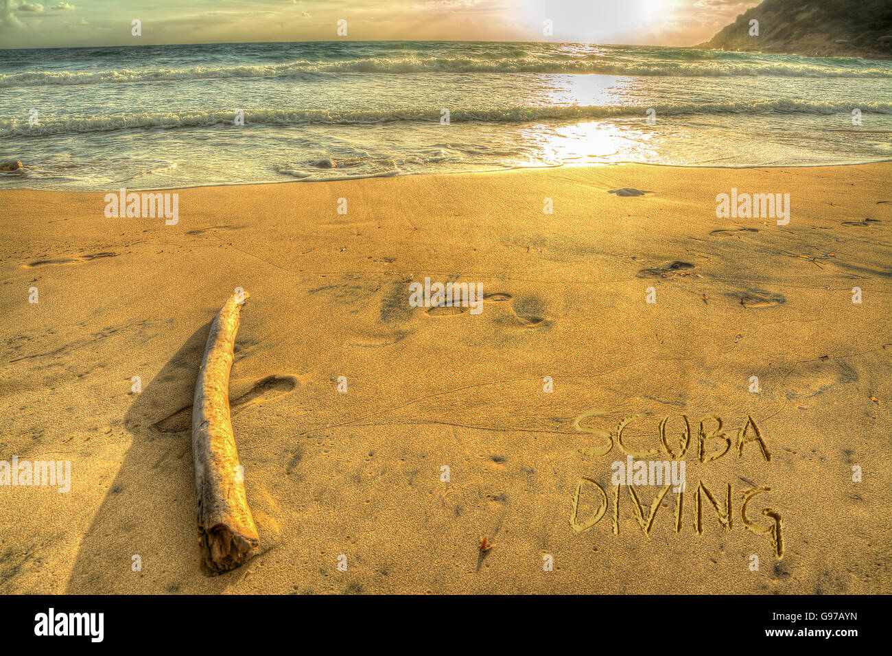 "scuba diving" written on a golden shore at sunset Stock Photo - Alamy