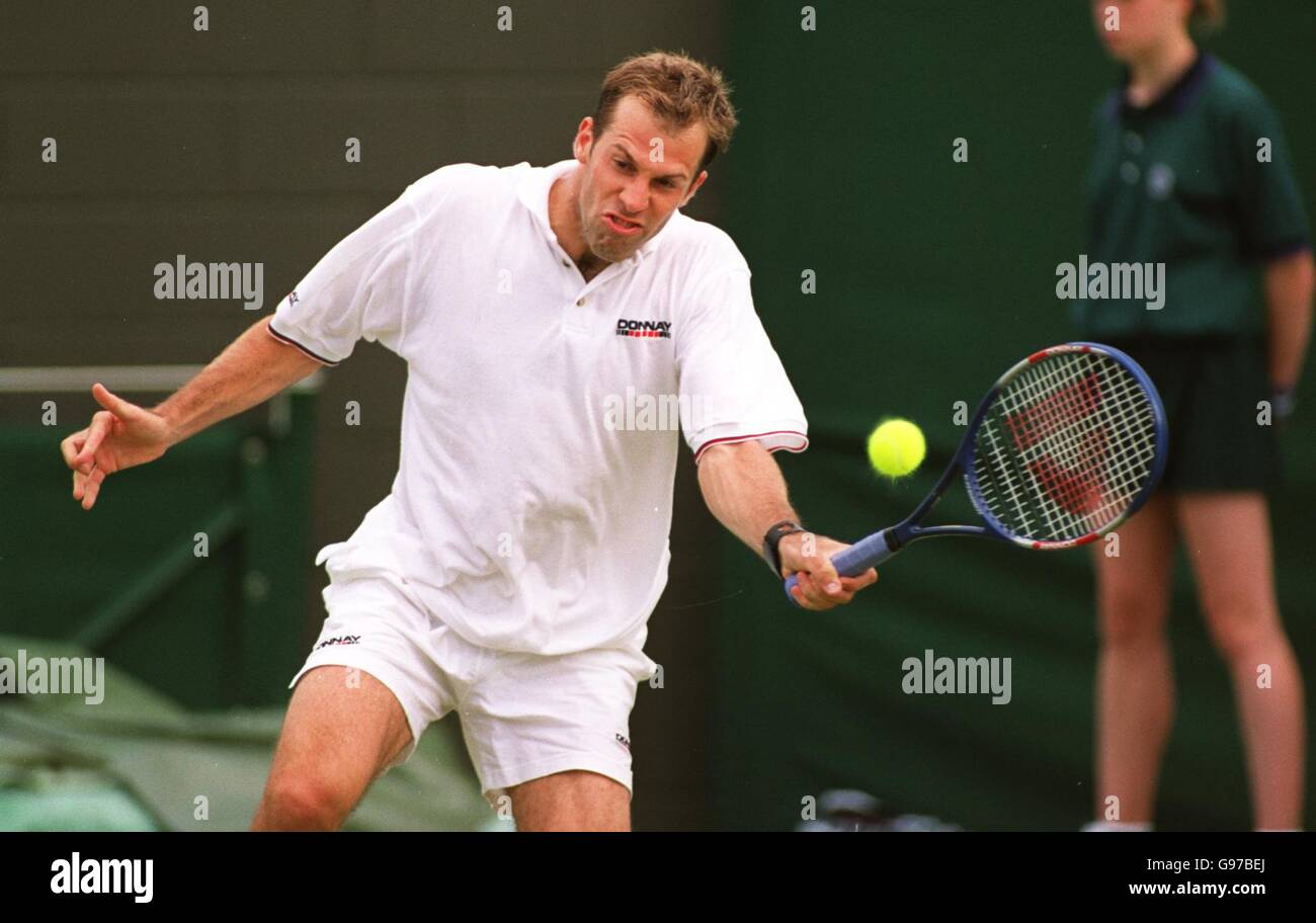 Tennis - Wimbledon. Greg Rusedski during his match with Arvind Parmar ...