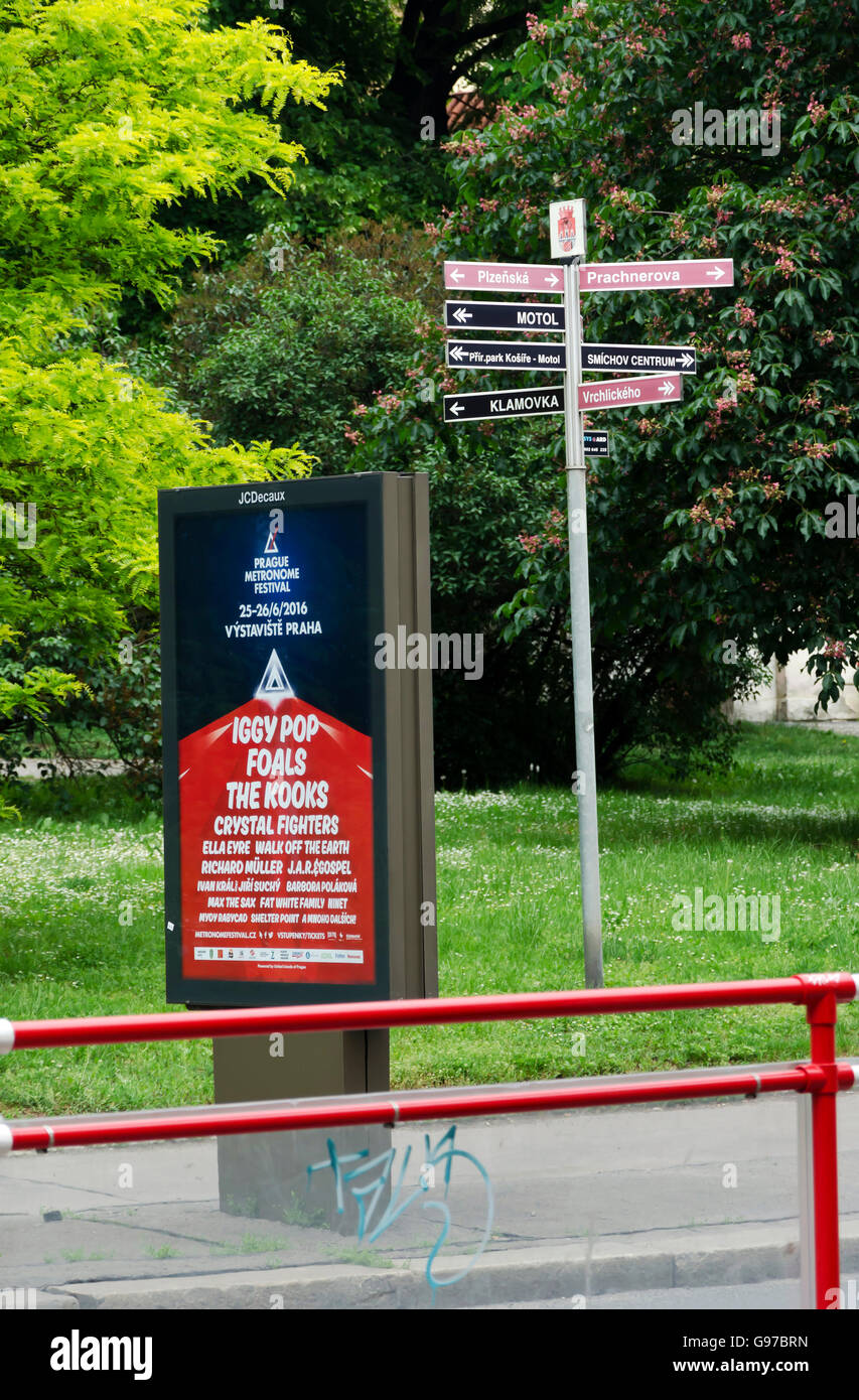 Direction sign and an advert for a music festival near the centre of ...
