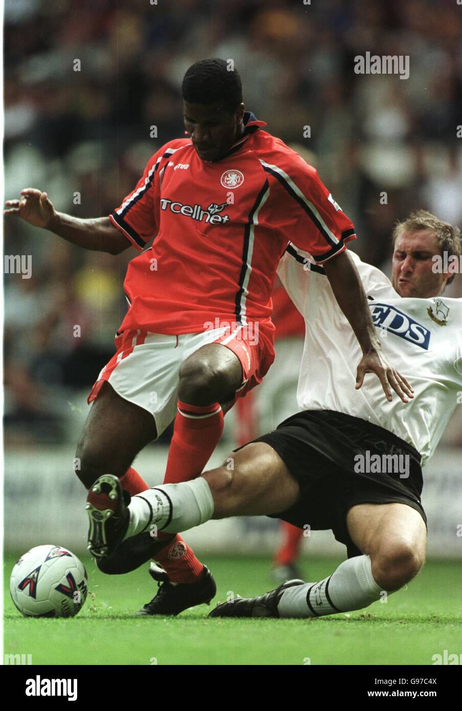 l-r; Middlesbrough's Hamilton Ricard is pulled down for a penalty by ...