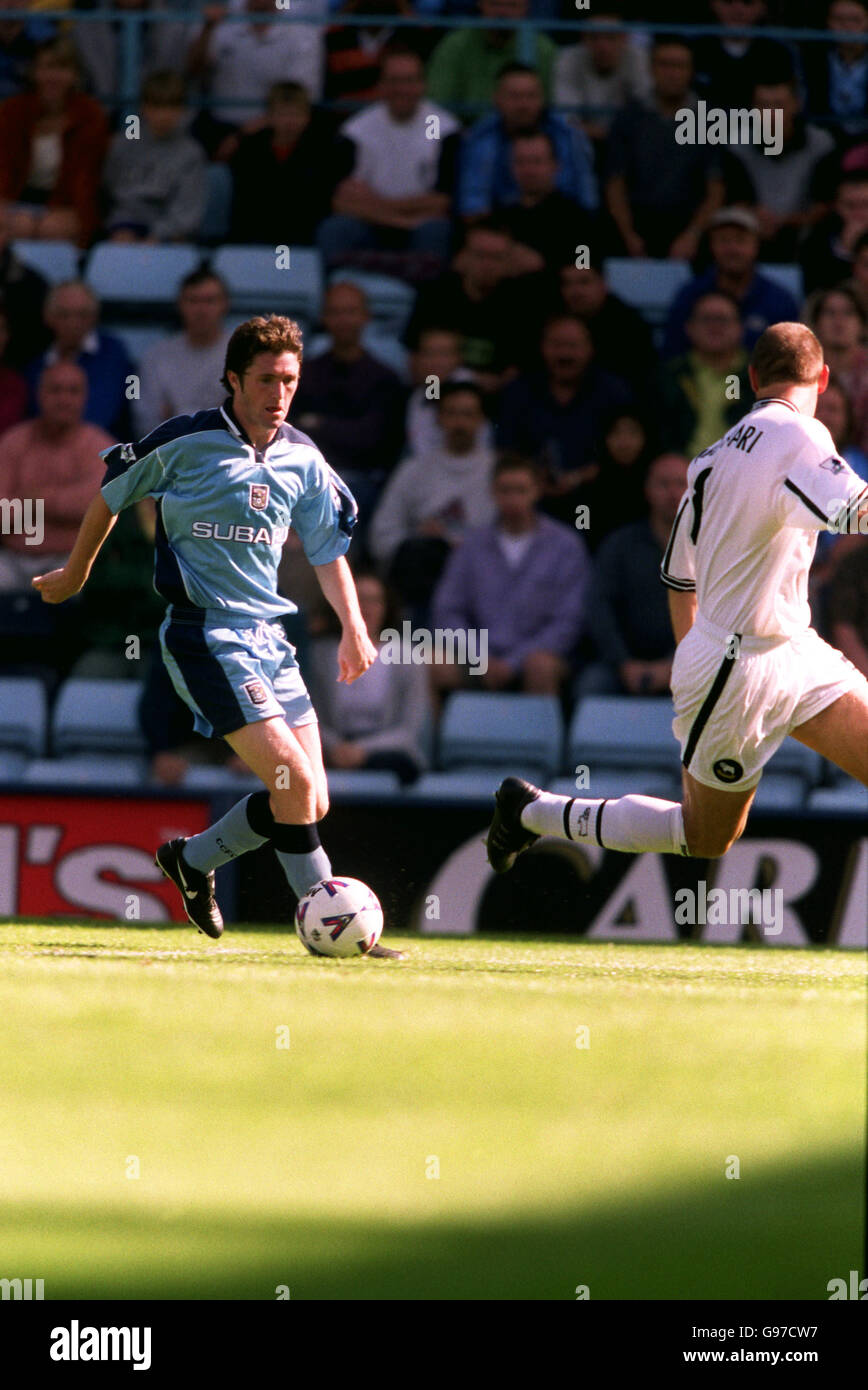 Coventry City's Robbie Keane runs at the Derby County defence as ...