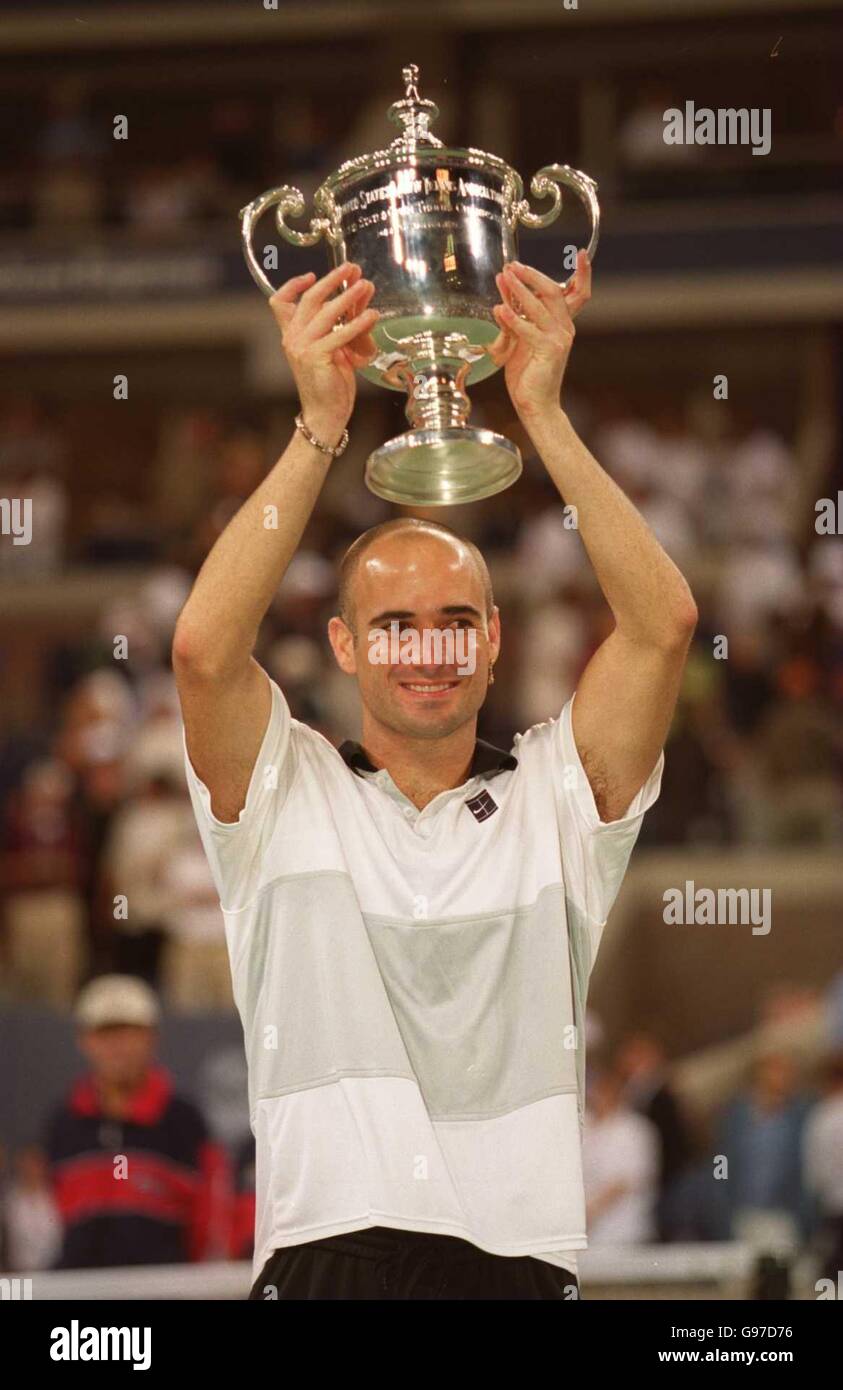 Andre Agassi lifts the U.S Open trophy the second Grand Slam of the ...
