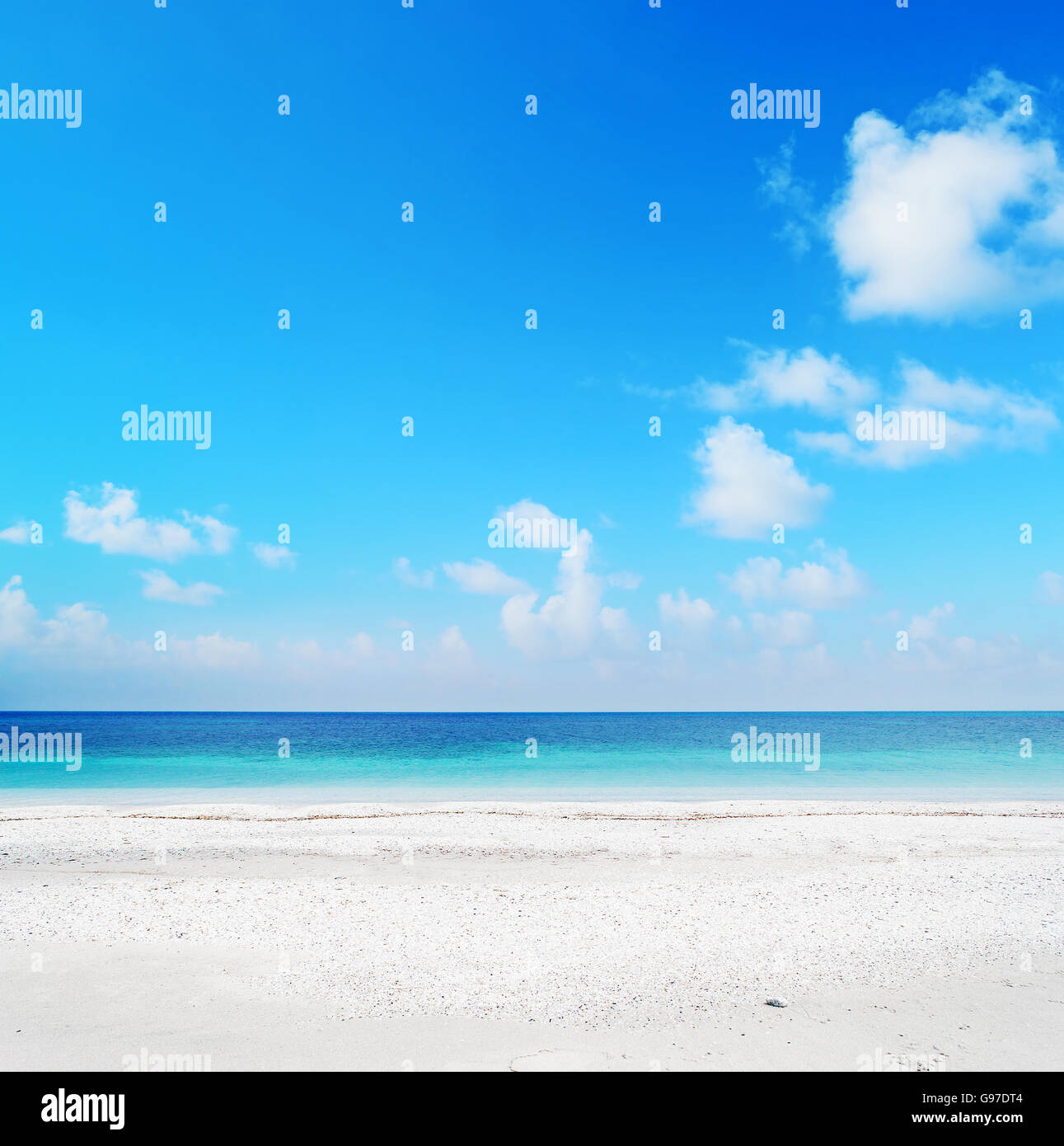 blue sky over a tropical beach Stock Photo - Alamy