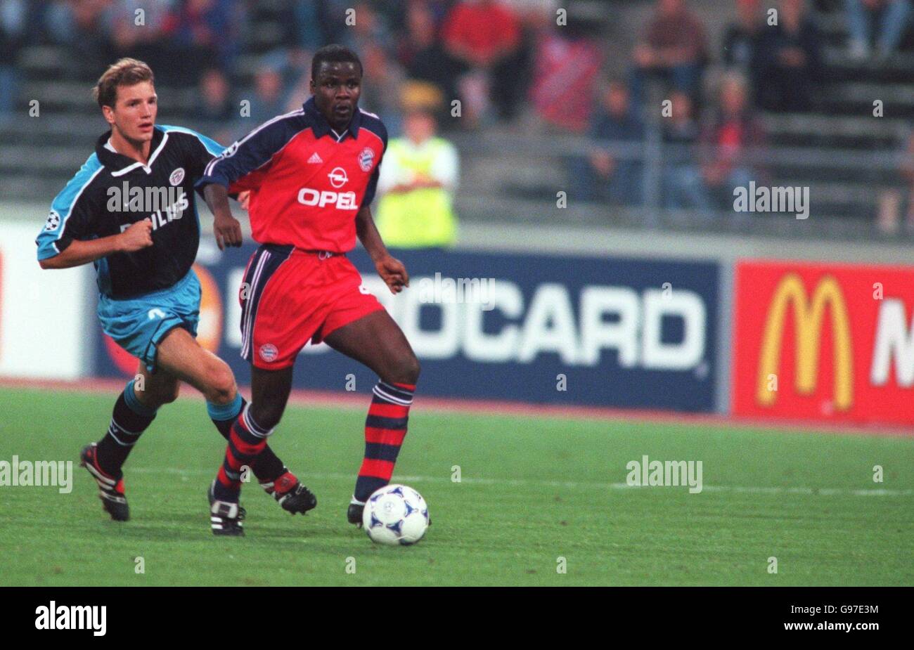 Bayern munichs samuel kuffour right is put under pressure hi-res stock ...