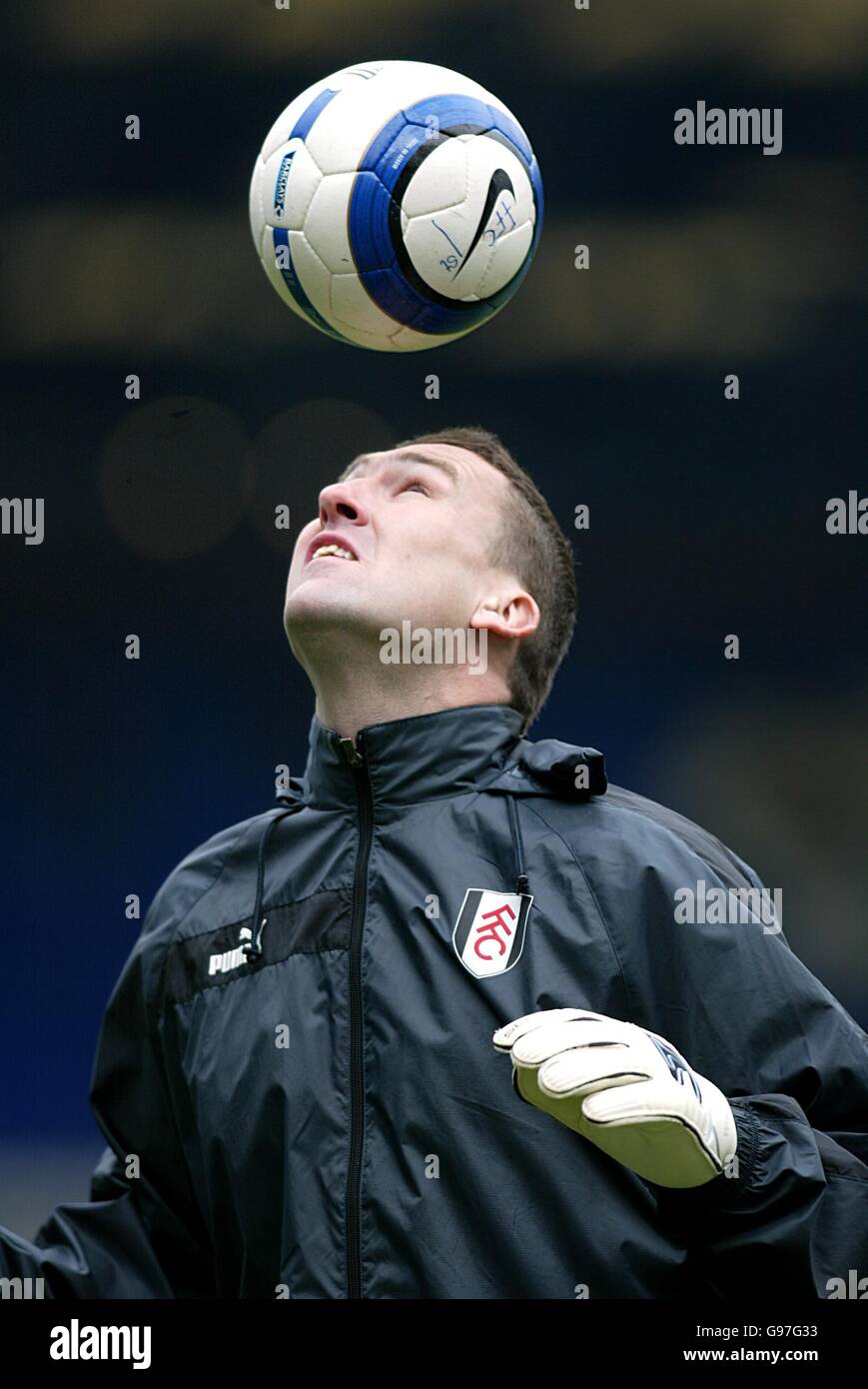 Fulham goalkeeper Mark Crossley practices some skills prior to kick off ...