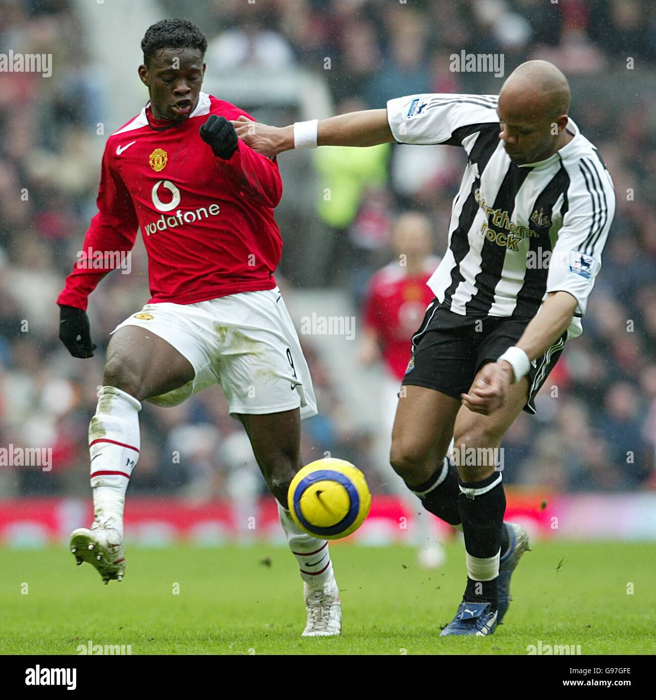Manchester United's Louis Saha and Newcastle United's Jean Alain ...
