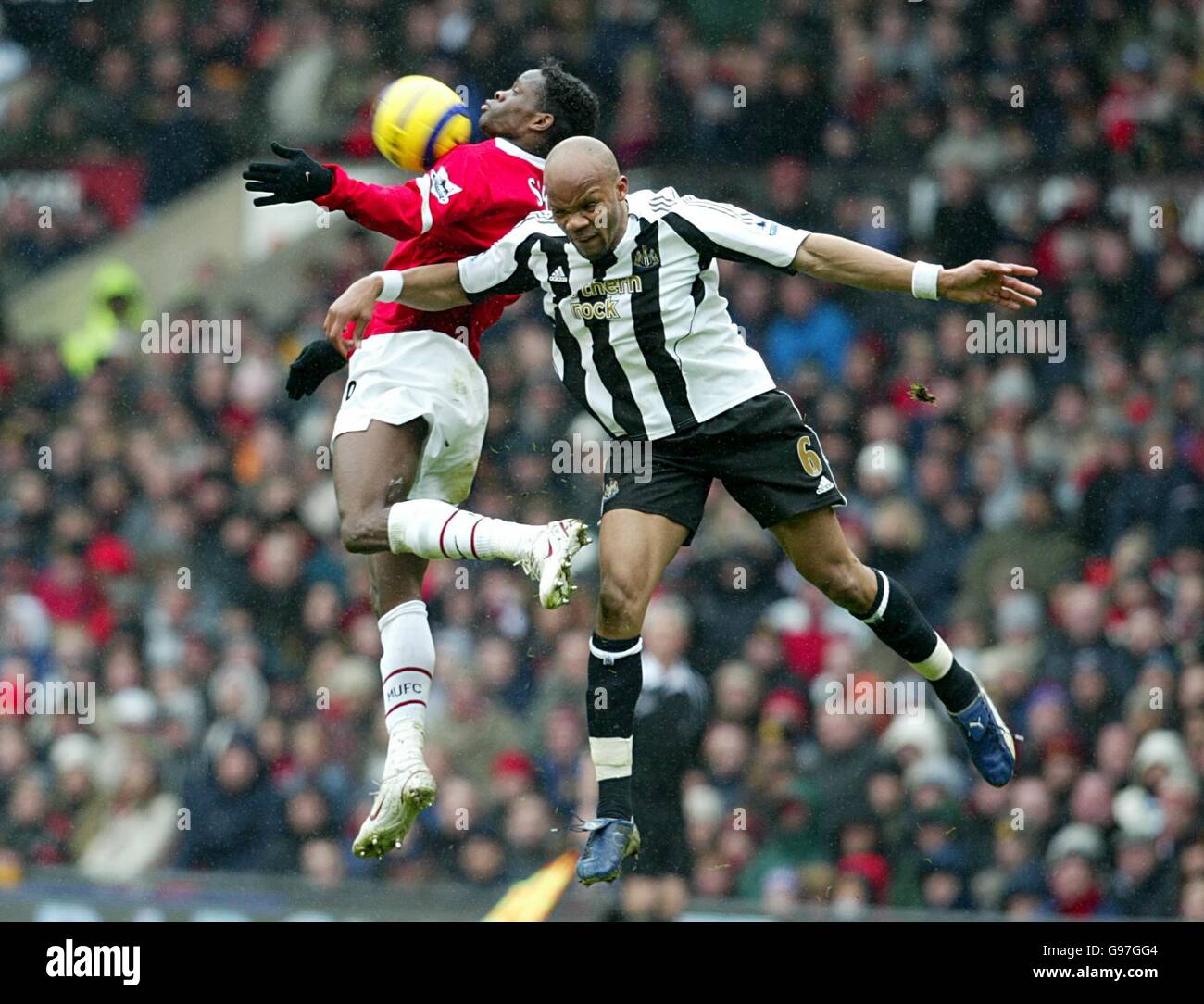 Manchester uniteds louis saha and newcastle uniteds jean alain boumsong ...