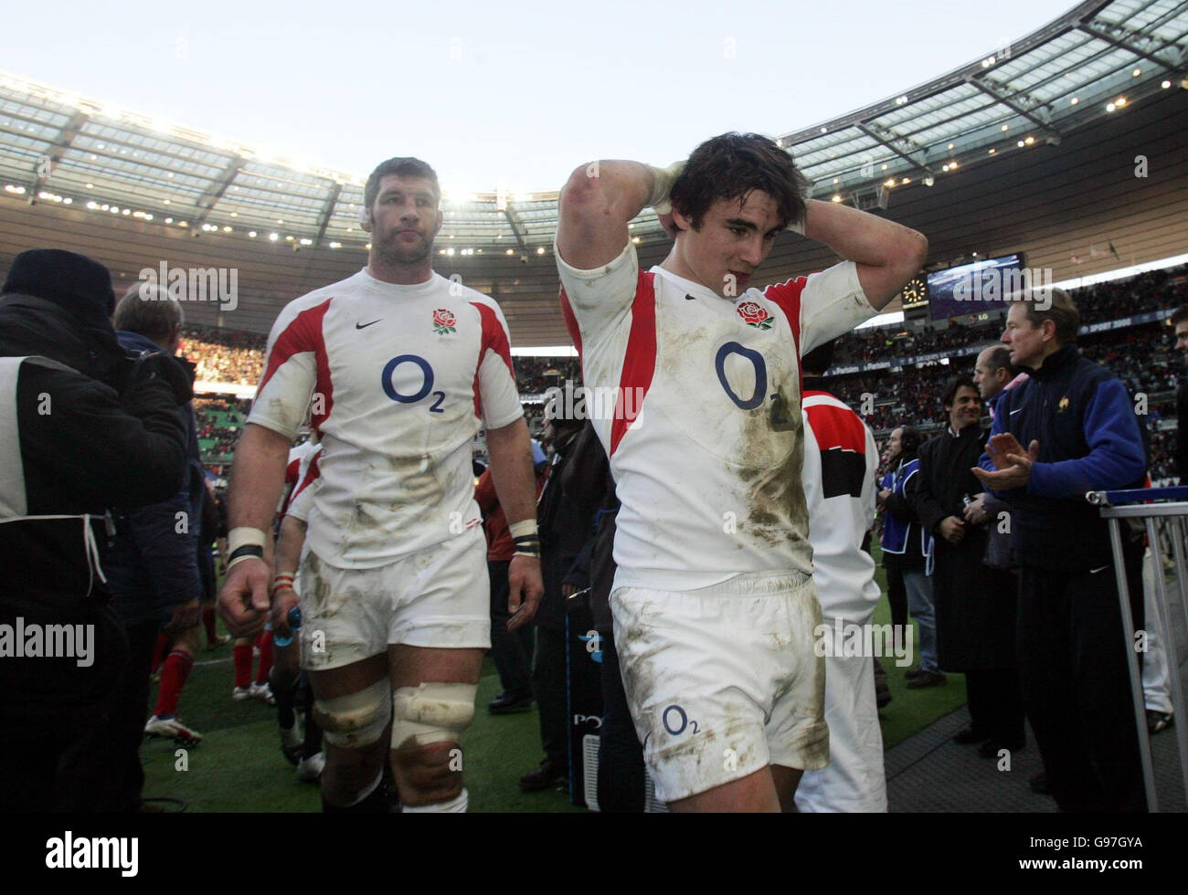 England's Harry Ellis holds his head as he leaves the field after their ...