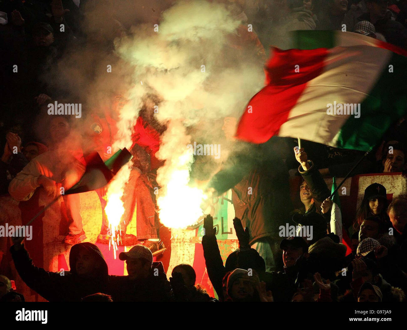 Roma fans light flares during the UEFA Cup, fourth round, second leg ...