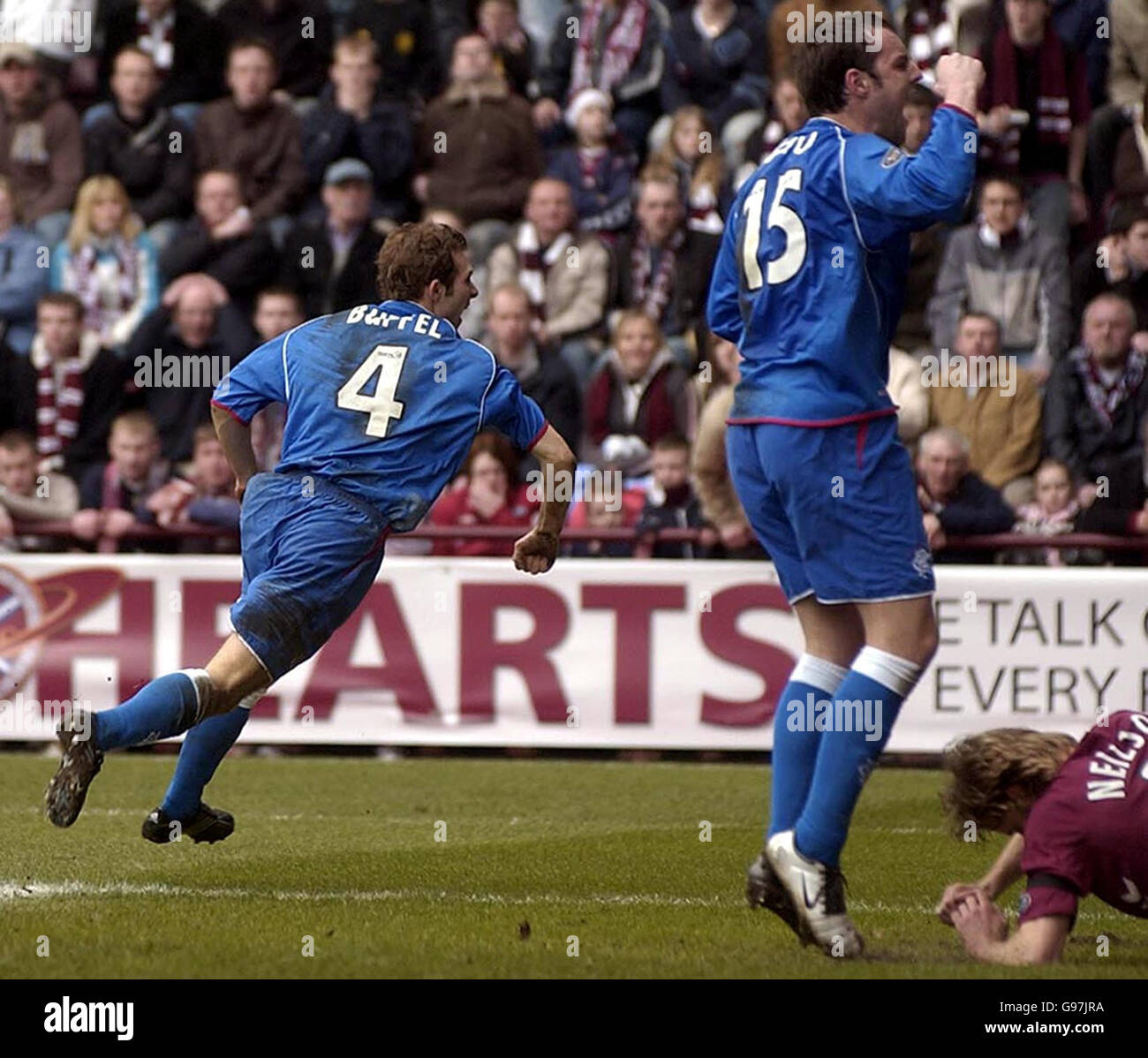Rangers' Thomas Buffel (L) runs away to celebrate his equaliser against ...
