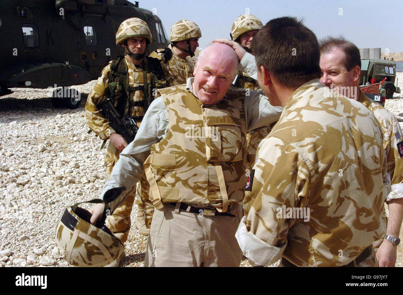 Defence Secretary John Reid arrives by helicopter at Al-Muthanna in ...