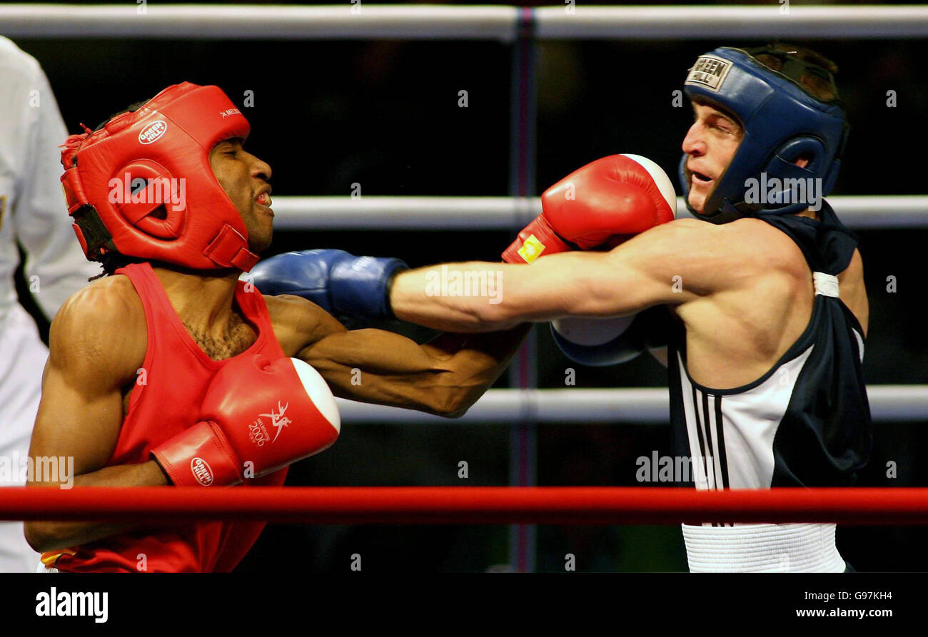 England's Nicholas MacDonald (R) in action with Nigeria's Danladi ...