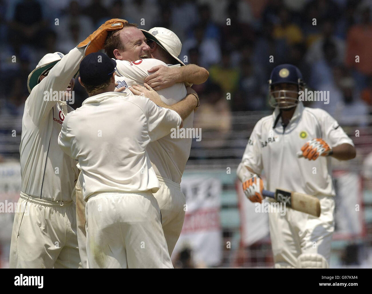 England's Shaun Udal (C) celebrates his first wicket during the third ...