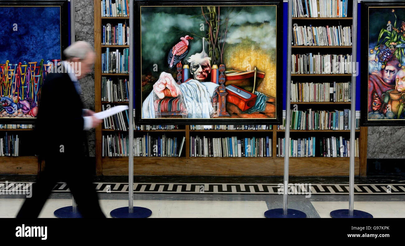 A patron of the Royal Dublin Society Library walks past an exhibition ...