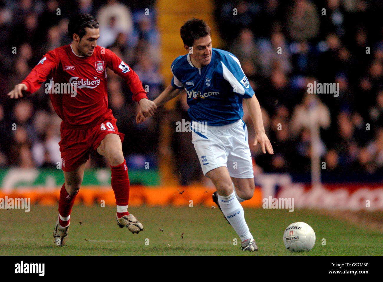 Birmingham City's Marcos Painter and Liverpool's Luis Garcia battle for ...
