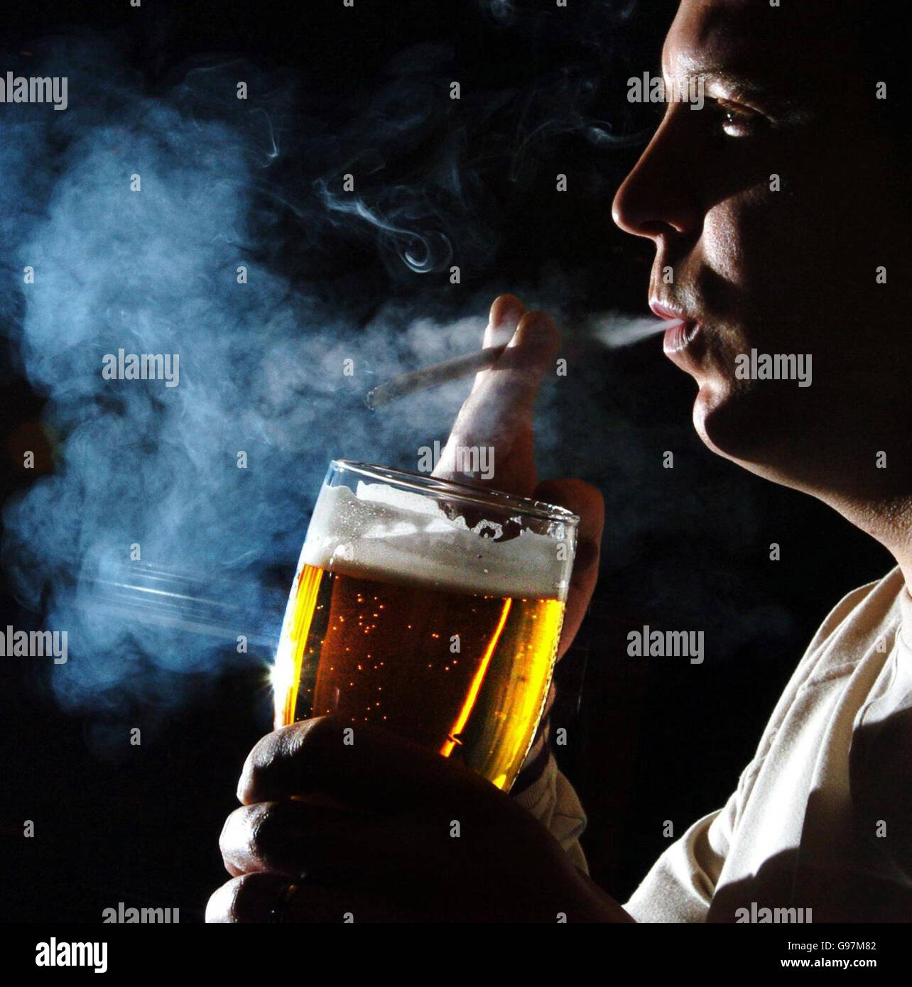 Old man smoking beer hi-res stock photography and images - Alamy