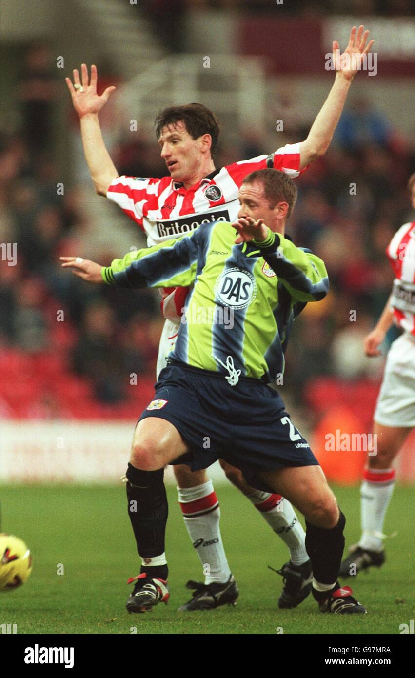 L-R; Stoke's Chris Short attempts to tackle Bristol City's Peter Beadle ...