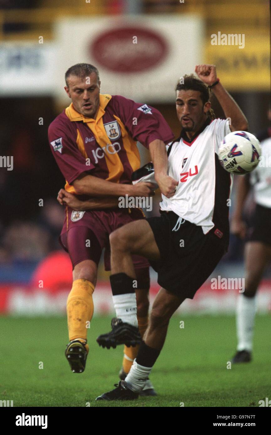 Coventry City's Moustapha Hadji (right) battles with Bradford City's ...