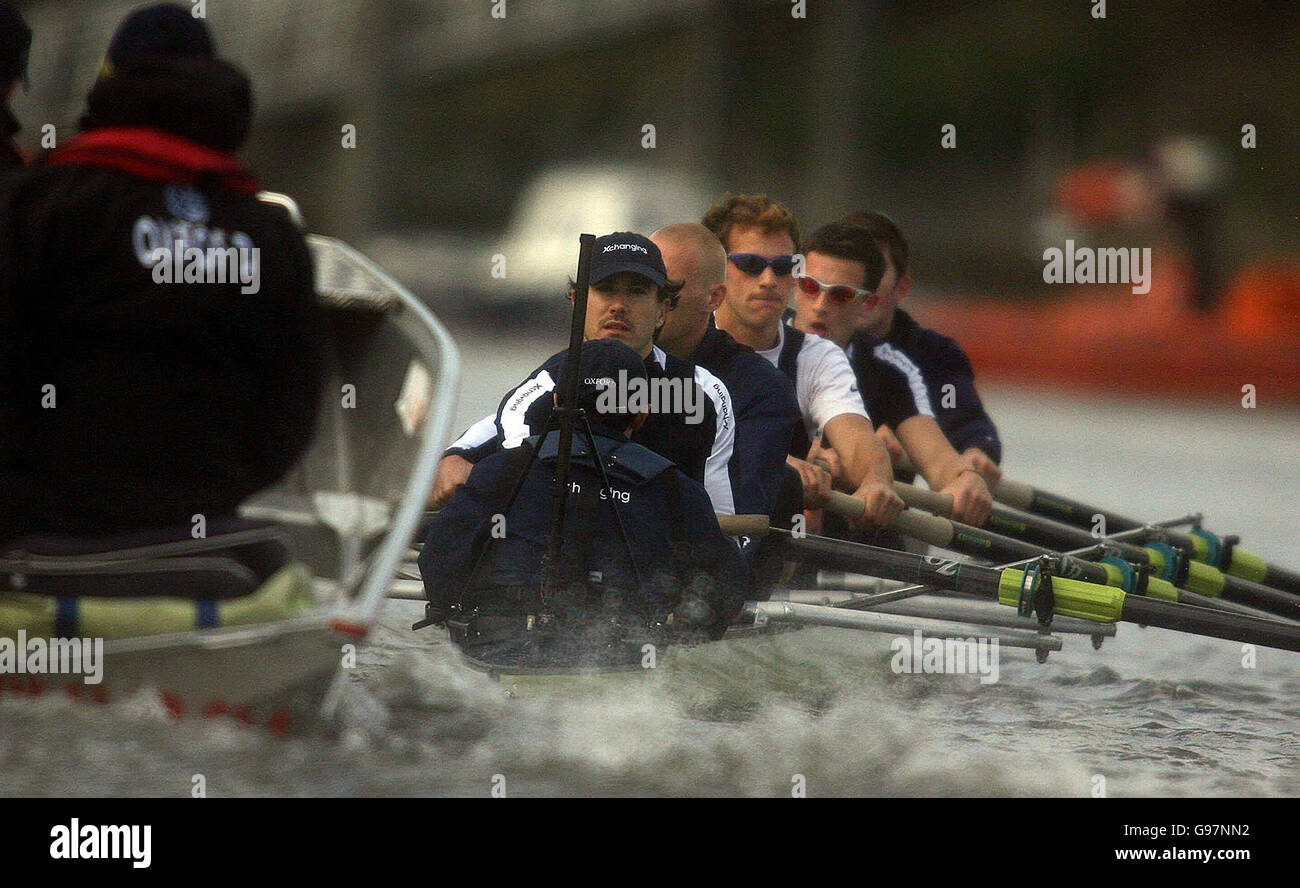 Oxford stroke Bastien Ripoll keeps an eye on coach Sean Bowden (far ...