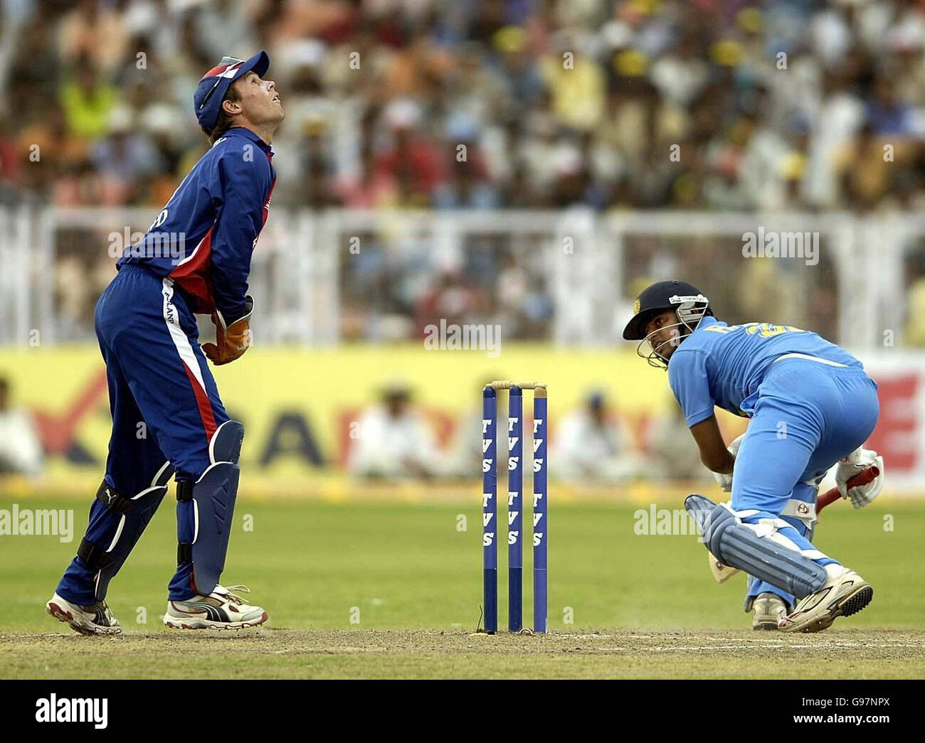 Indian batsman Suresh Raina plays a shot that takes the ball over the ...
