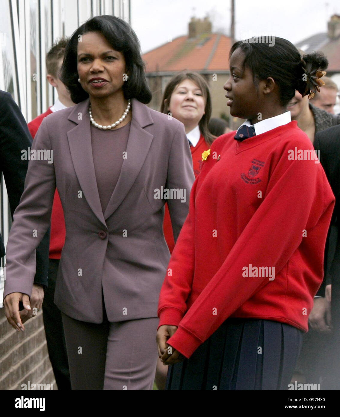 Walks with pupil as she arrives to visit pleckgate school hi-res stock ...