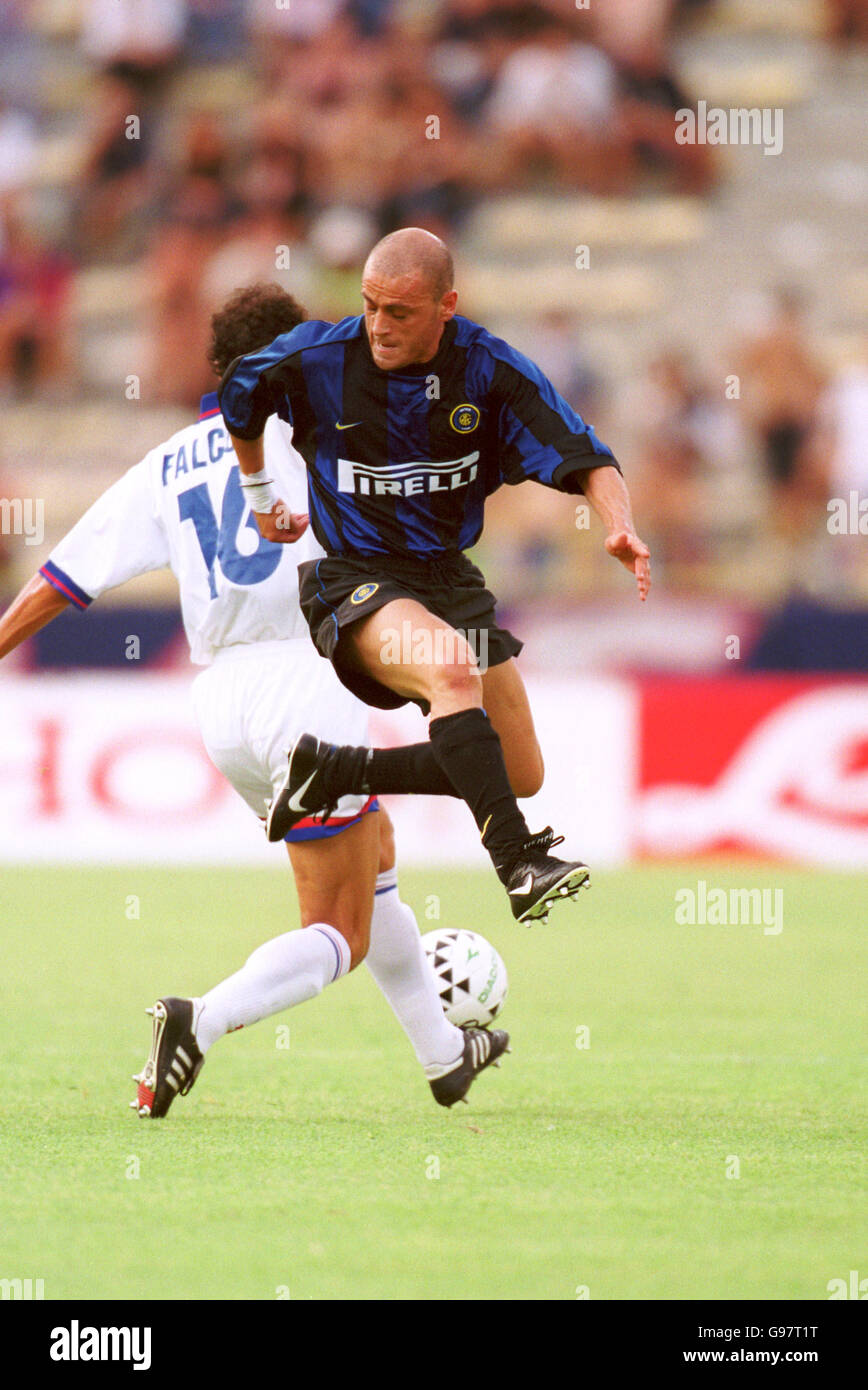 Inter Milan's Grigoris Georgatos (right) is dispossessed by Bologna's ...