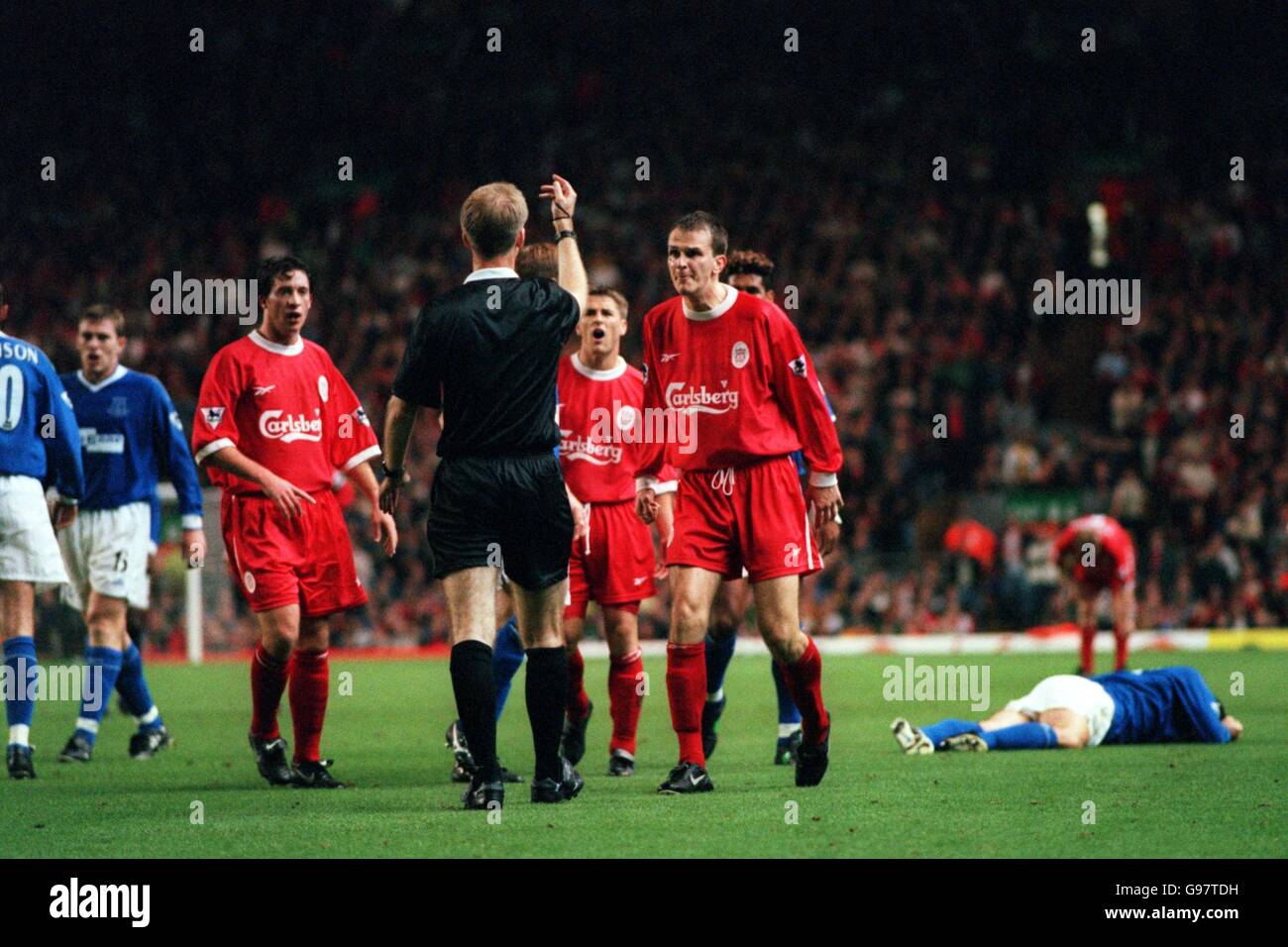 Referee Mike Riley (centre) calls over Liverpool's Michael Owen (centre ...