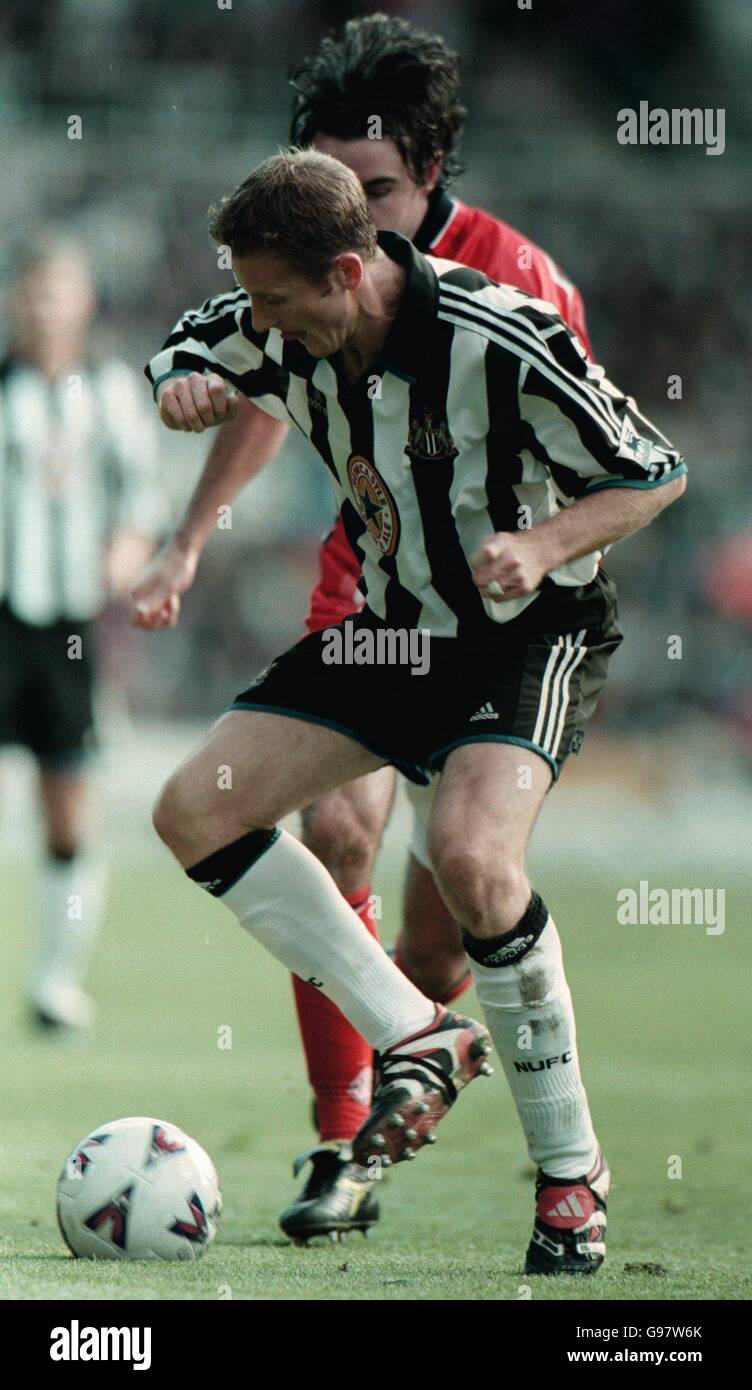 Newcastle United's Kevin Gallacher (front) shields the ball from ...