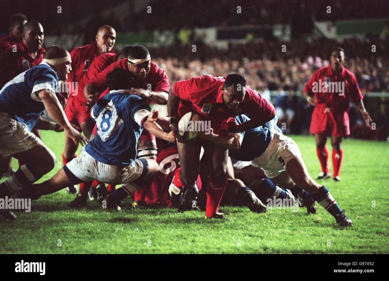 Tonga's 'Isileli Fatani powers through to score a try for Tonga Stock ...