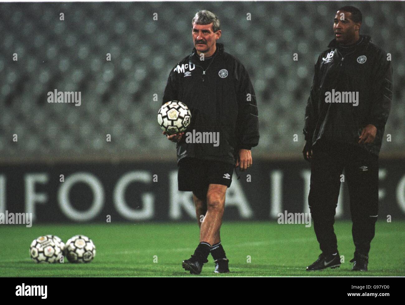 Celtic manager John Barnes trains watches his players train with ...