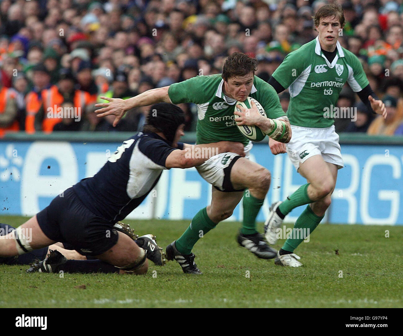 Ireland's Brian O'Driscoll is tackled by Scotland's Bruce Douglas ...