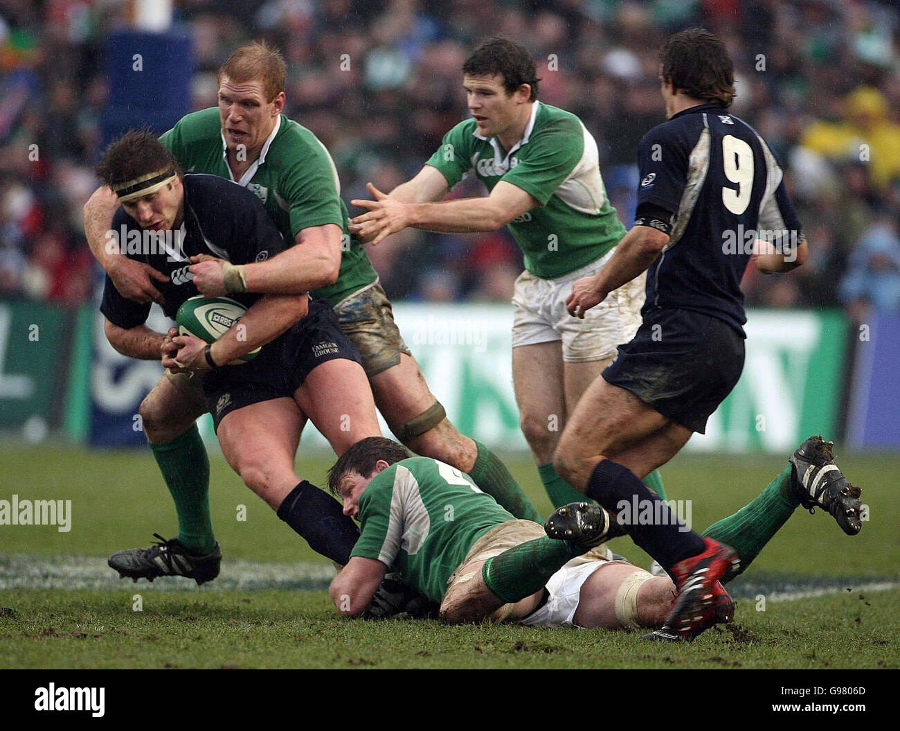 Scotland's Gavin Kerr (L) is tackled by Ireland's Paul O'Connell during ...