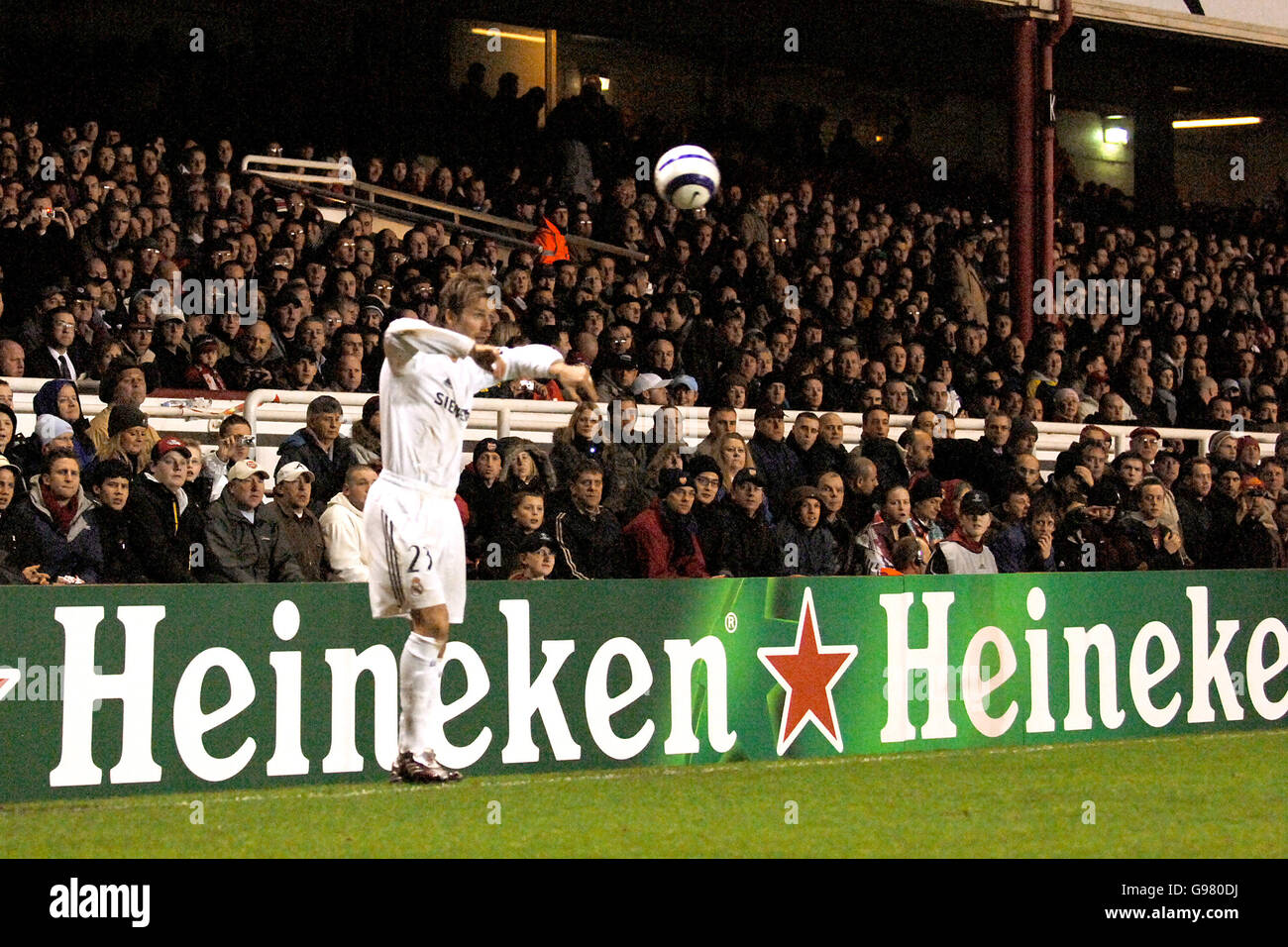 Real madrids david beckham take a throw hi-res stock photography and ...