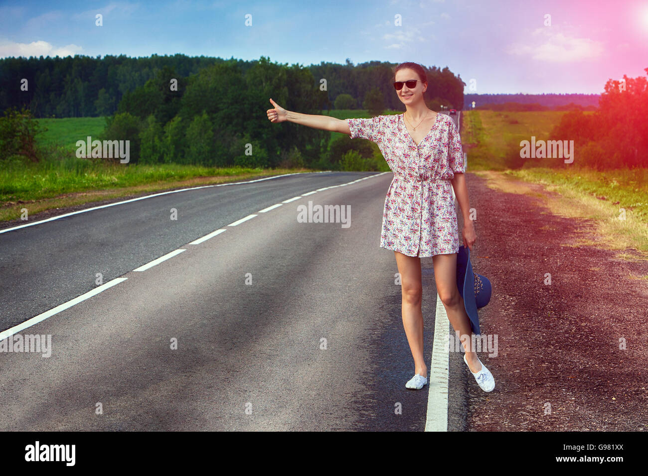 Girl Hitchhiking Stock Photos & Girl Hitchhiking Stock Images - Alamy