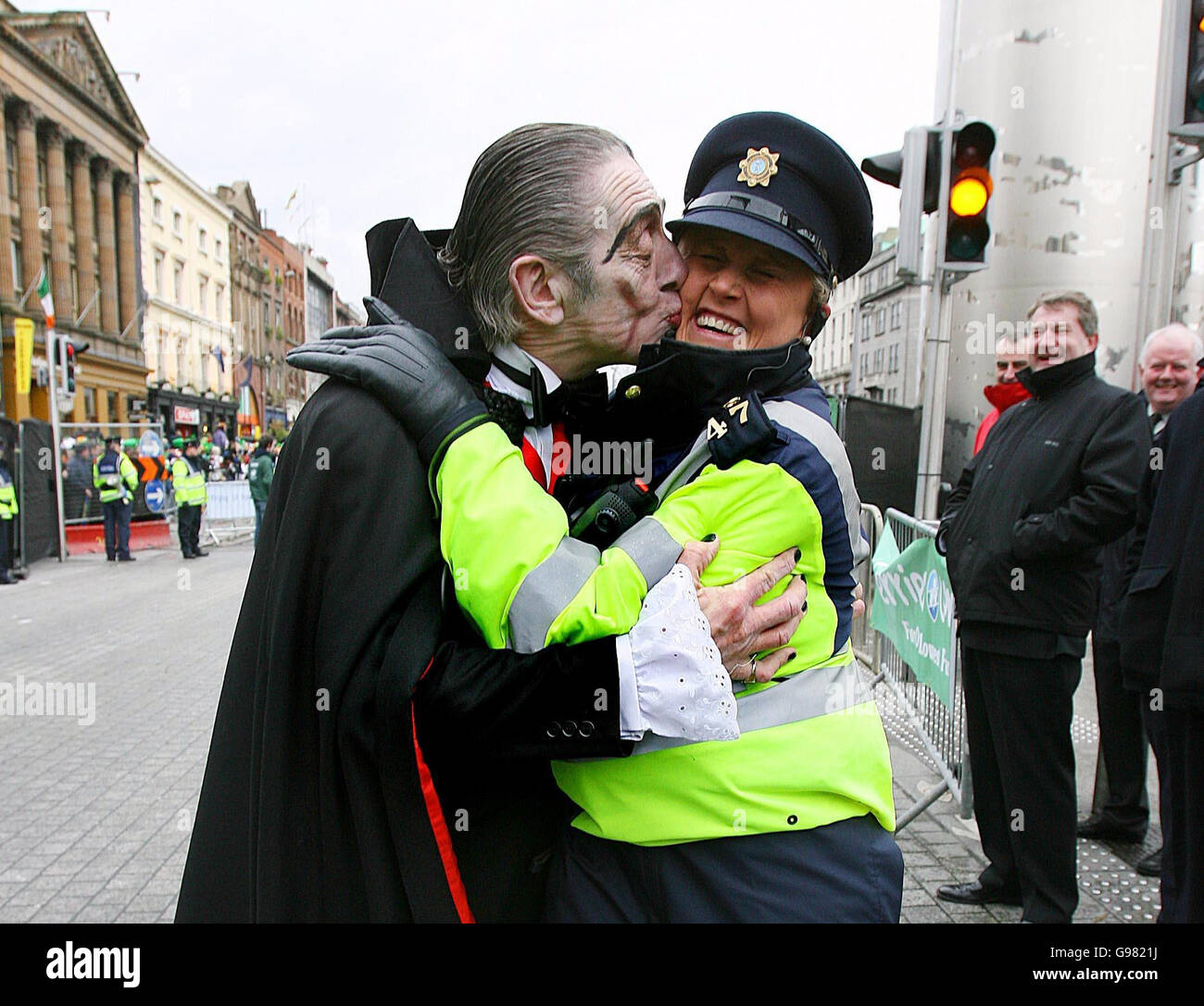 'Paddy Drac' kisses a Garda during the St Patricks Day Parade in Dublin ...