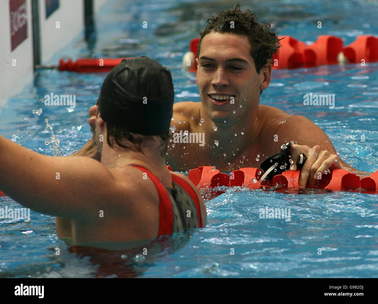 England's Simon Burnett shakes hands with Anthony Howard after his Men ...