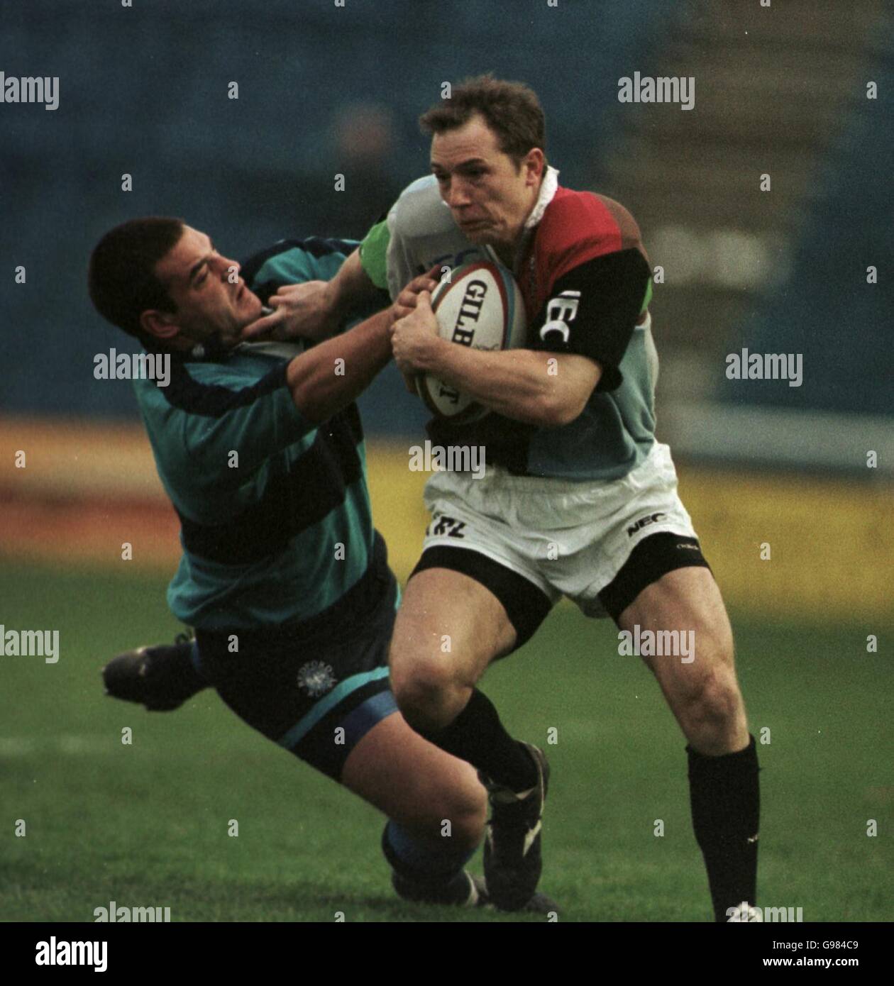 Harlequins' Rob Lilley tries to muscle his way past Bedford's Adam ...