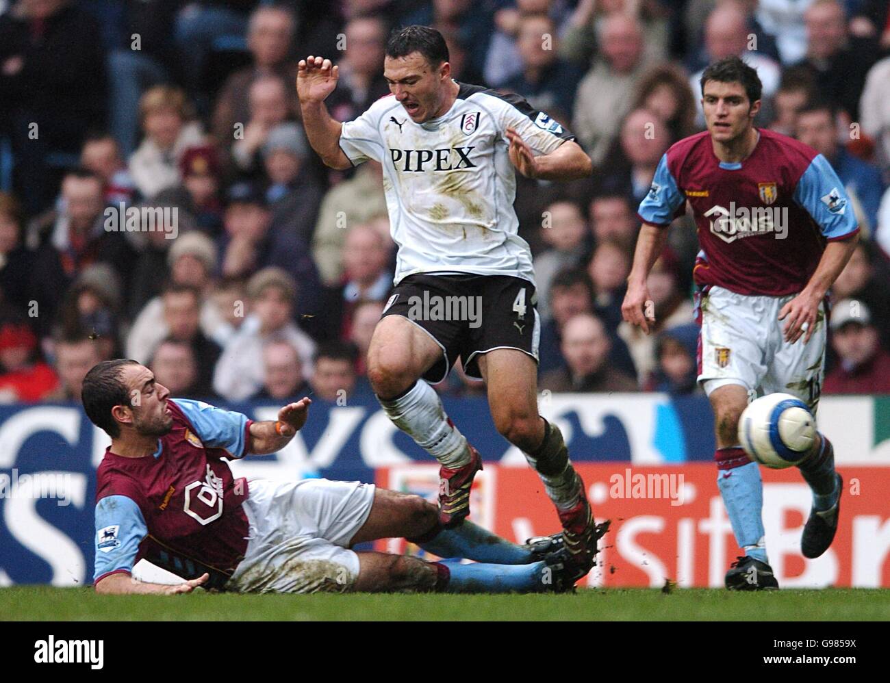 Aston Villa's Gavin McCann challenges Fulham's Steed Malbranque Stock ...