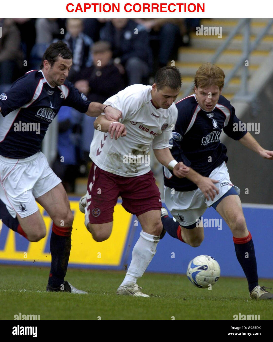 CAPTION CORRECTION: Should read: Heart's Rudi Skacel gets between ...