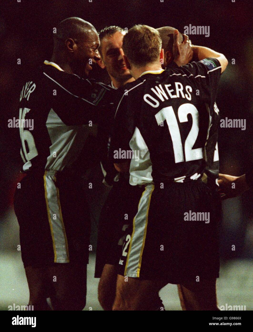 Notts County's Mark Warren (hidden) is congratulated on scoring the ...