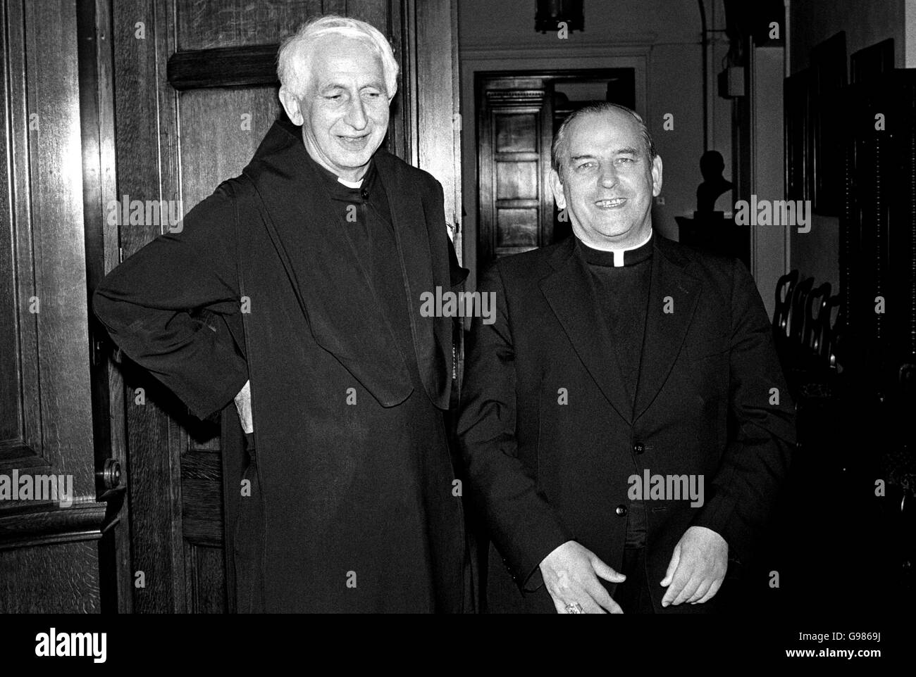 The Archbishop of Westminster, Cardinal Basil Hume (left), with the ...