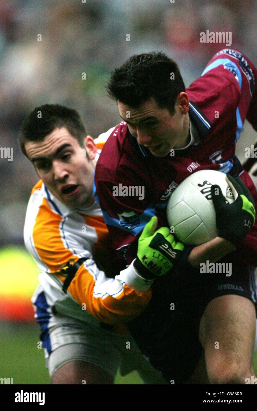 Kevin Niblock of St Galls Co Antrim in action against Finian Hanley of ...