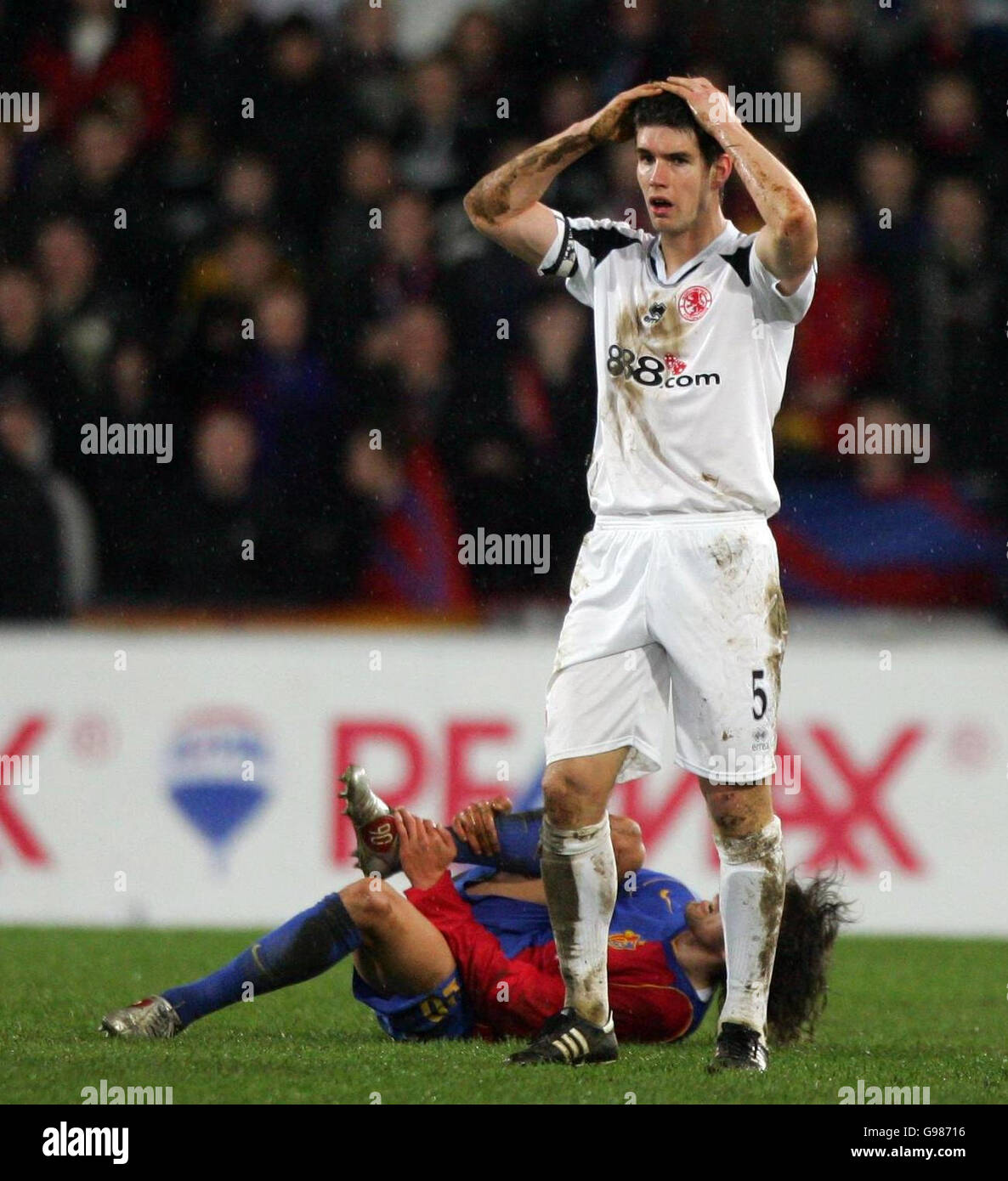 Middlesbrough's Chris Riggott shows his dejection after getting yellow ...
